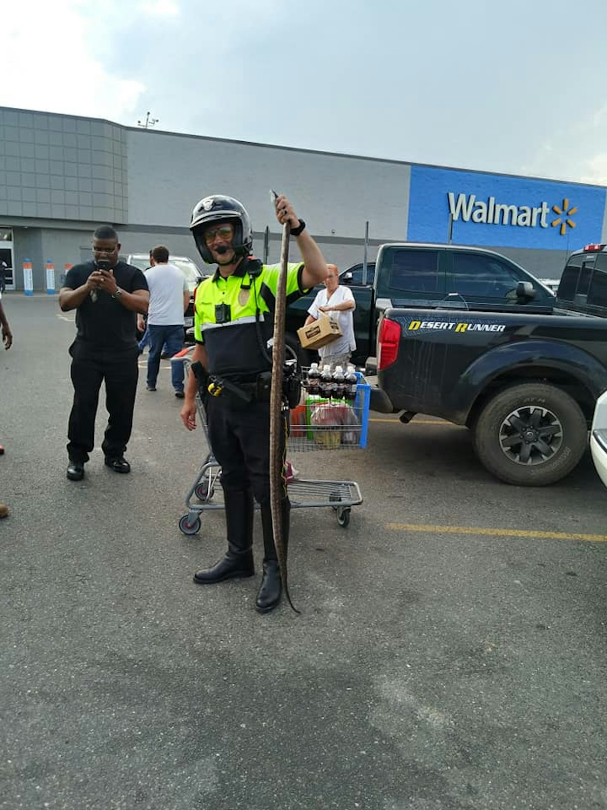Photo: Texas Officer Captures Large Snake in Walmart Parking Lot ...