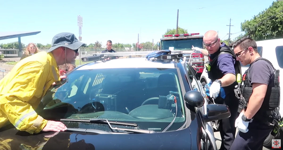 Video: California Firefighters Rescue Rookie Officer Trapped in Back of ...